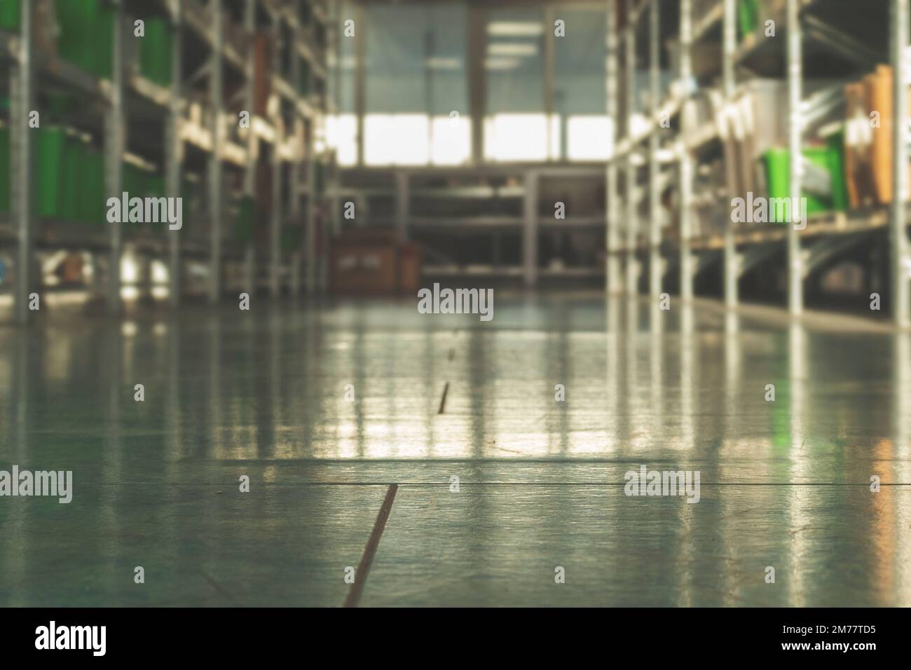 Low angle vew of rows of shelves with boxes in a modern industry ...