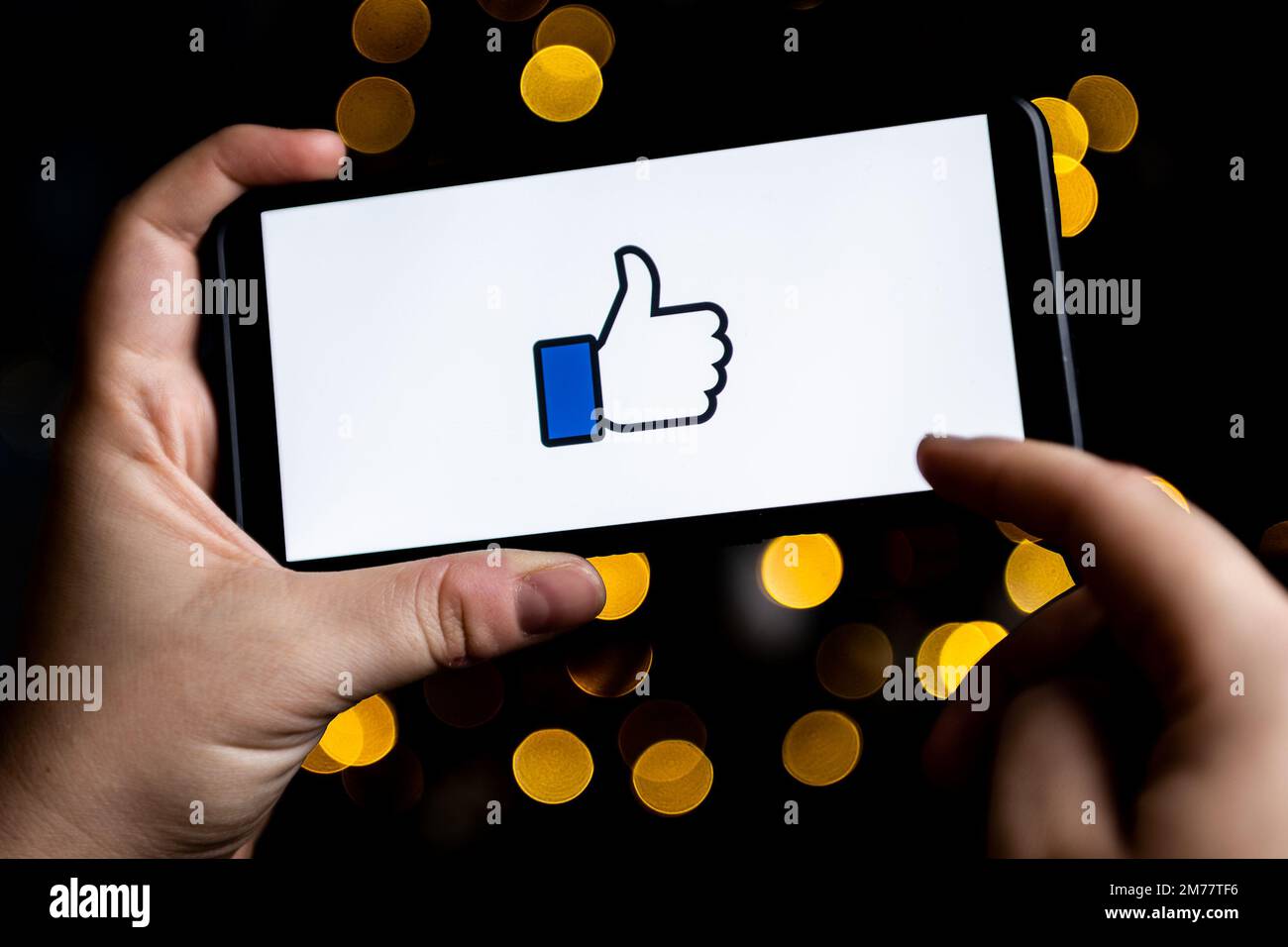 In this photo illustration a Like Button logo seen displayed on a ...