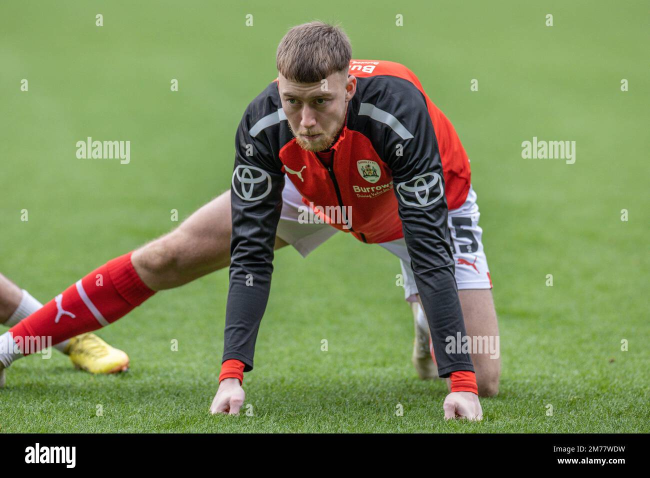 Jasper Moon #15 of Barnsley during the pre-game warmup during the ...