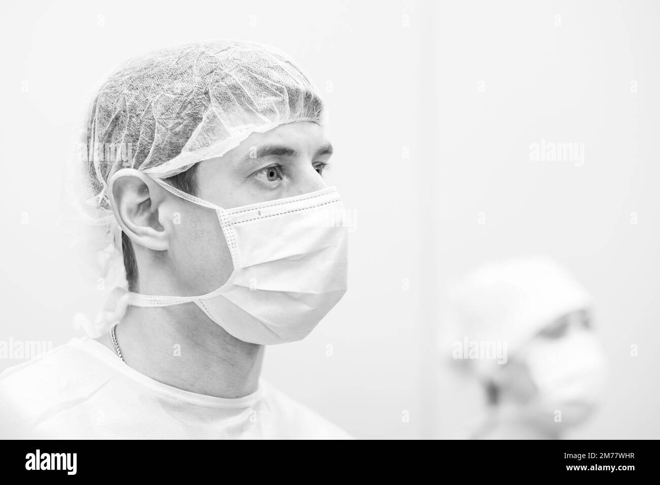 Caucasian male surgeon healthcare professional Black and White Stock ...