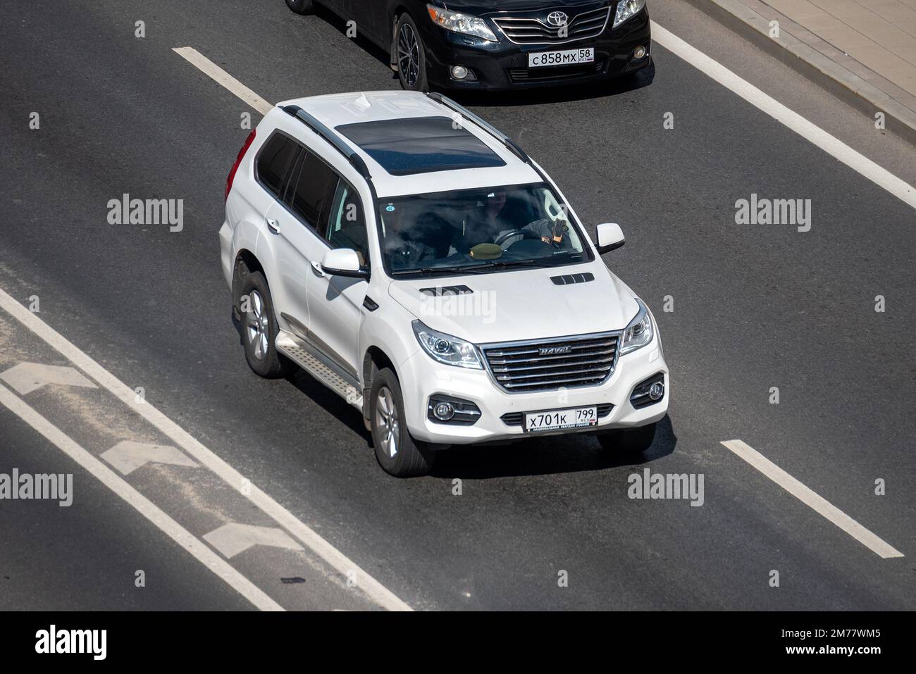 Moscow, Russia - September 27, 2022: Chinese SUV white car Haval H9 I 2017 driving on the road ...