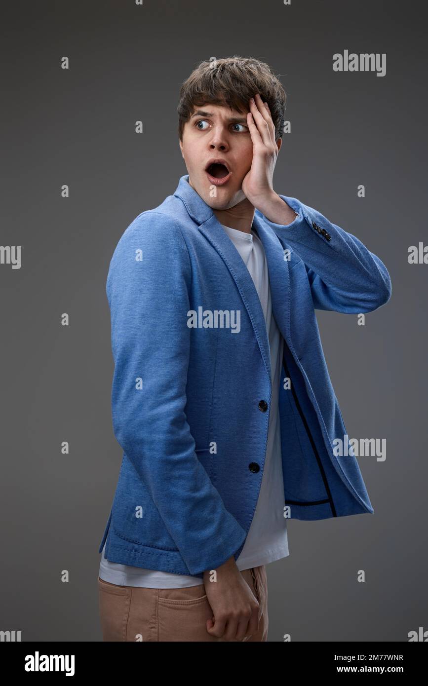 shocked man with surprise expression and excited face Stock Photo - Alamy