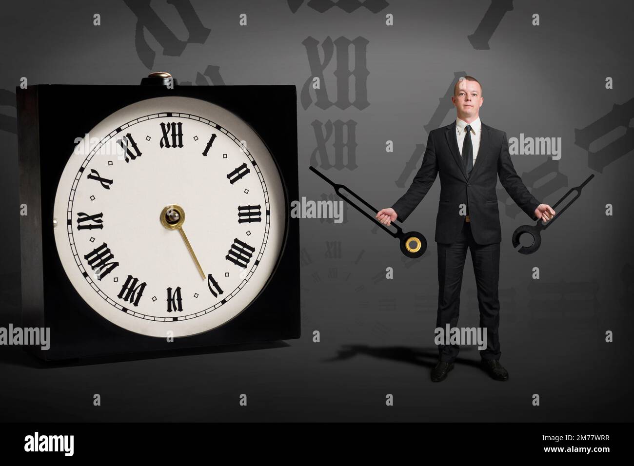 business man stopped the time, broke the clock Stock Photo - Alamy