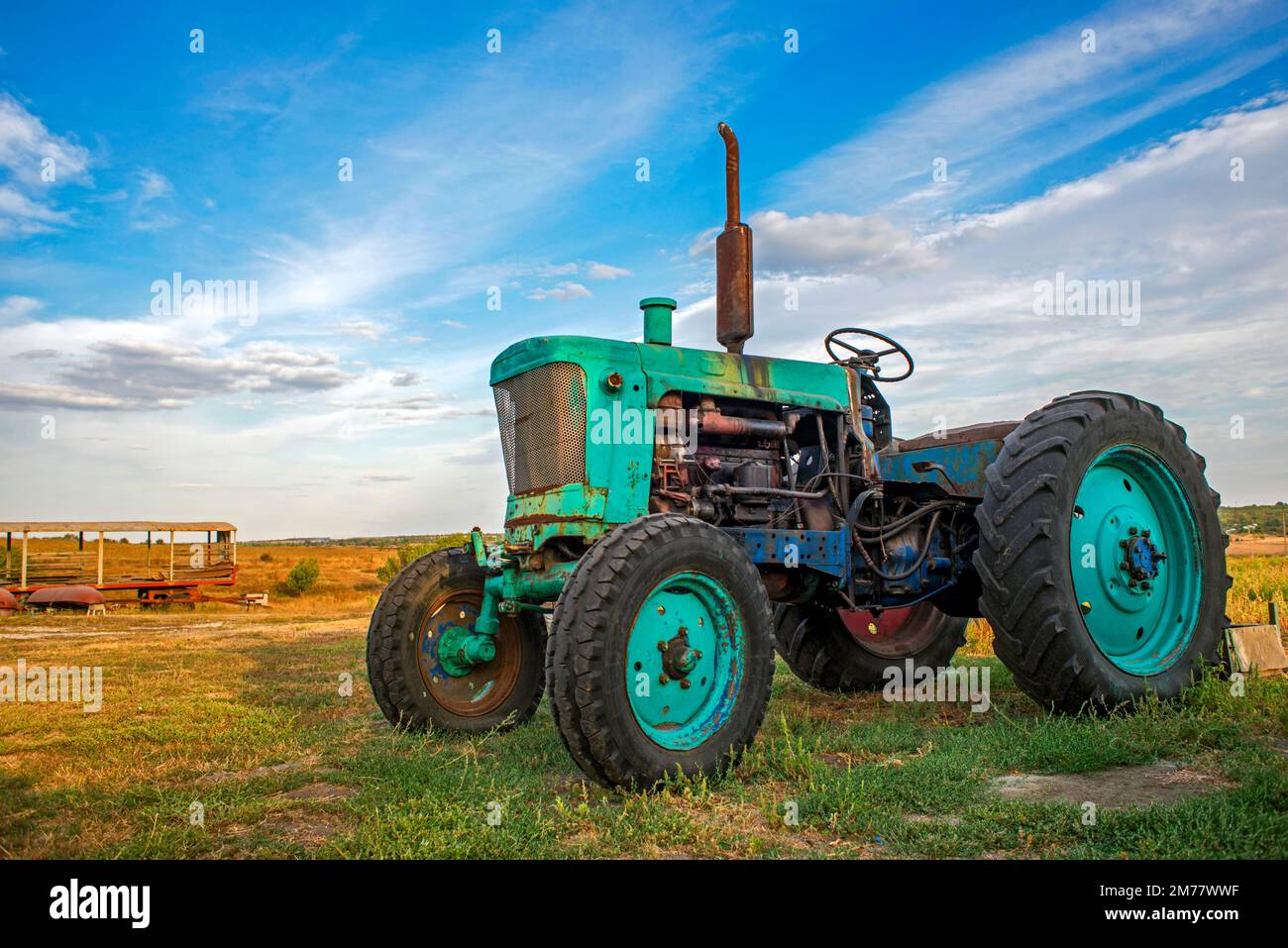 old tractor in field Stock Photo - Alamy