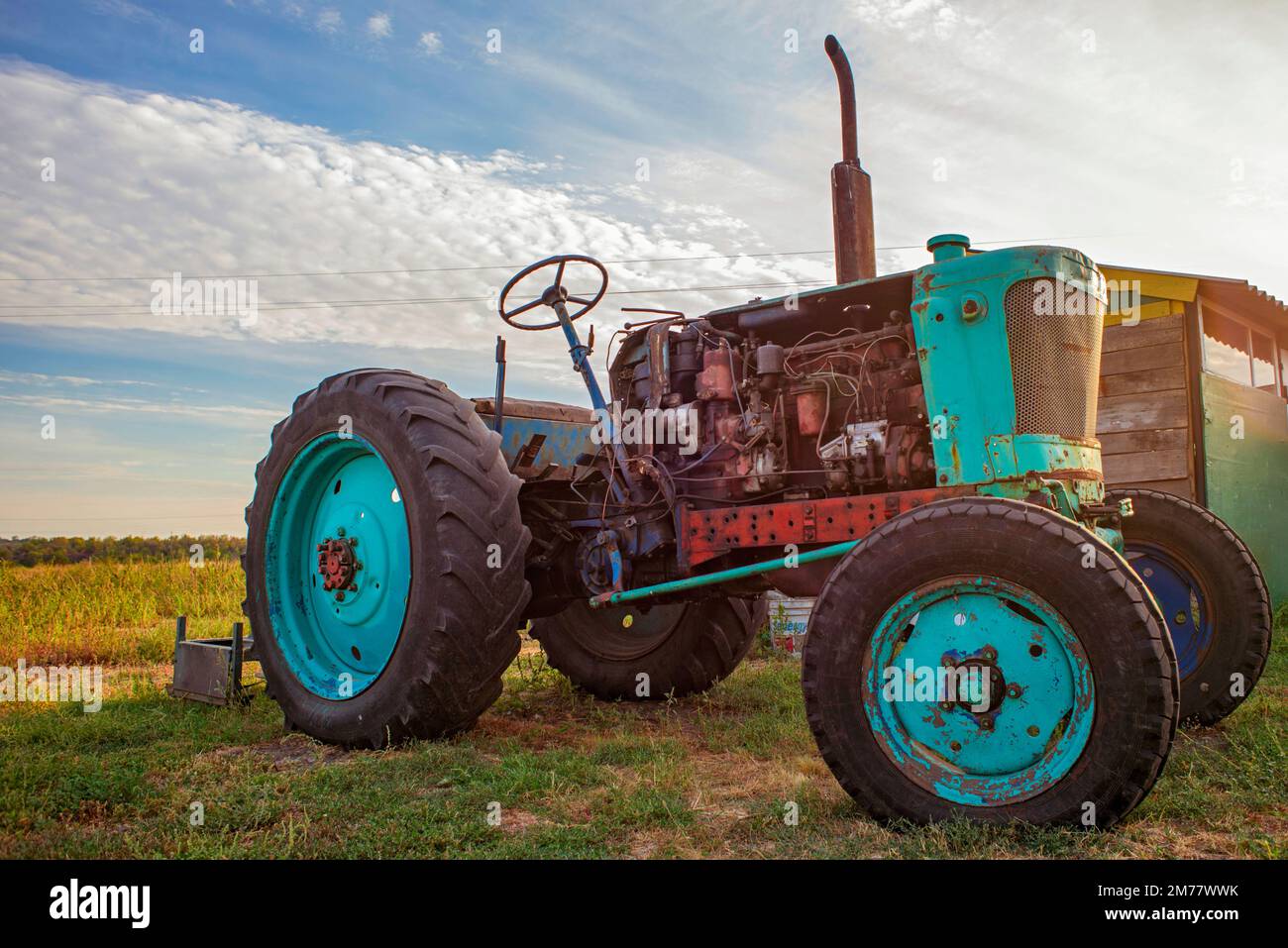 old tractor in field Stock Photo - Alamy