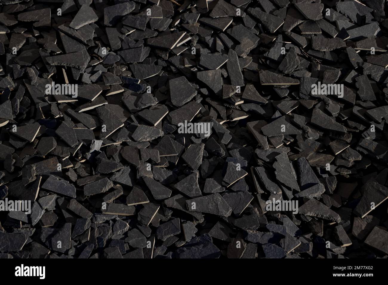 Dark grey broken slate background Stock Photo - Alamy