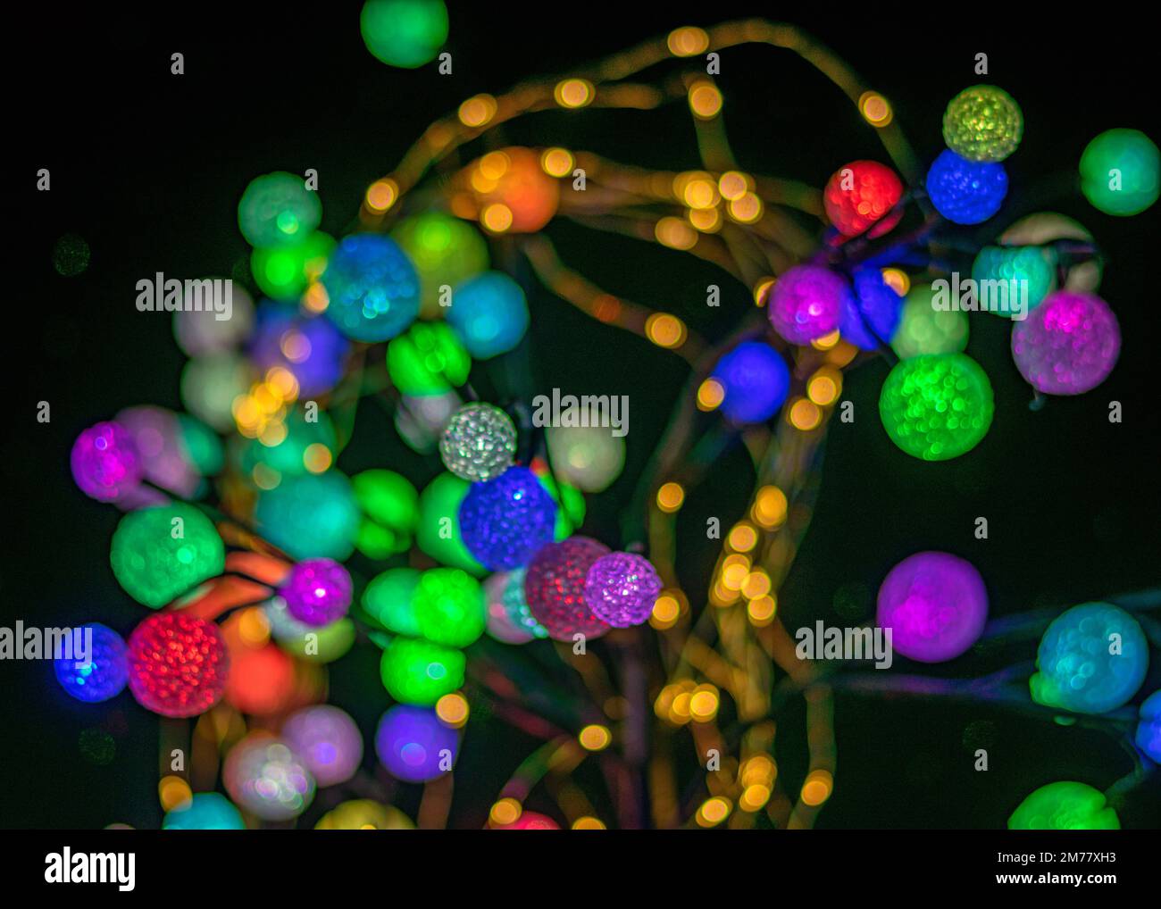 colorful balls of different sizes, bright lights, mixed size of ...