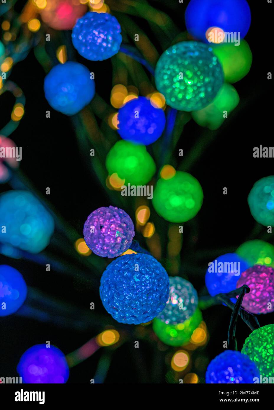 colorful balls of different sizes, bright lights, mixed size of ...