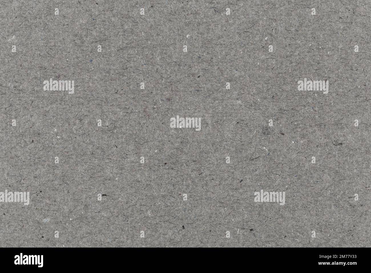 Dense cardboard paper closeup texture or background Stock Photo - Alamy