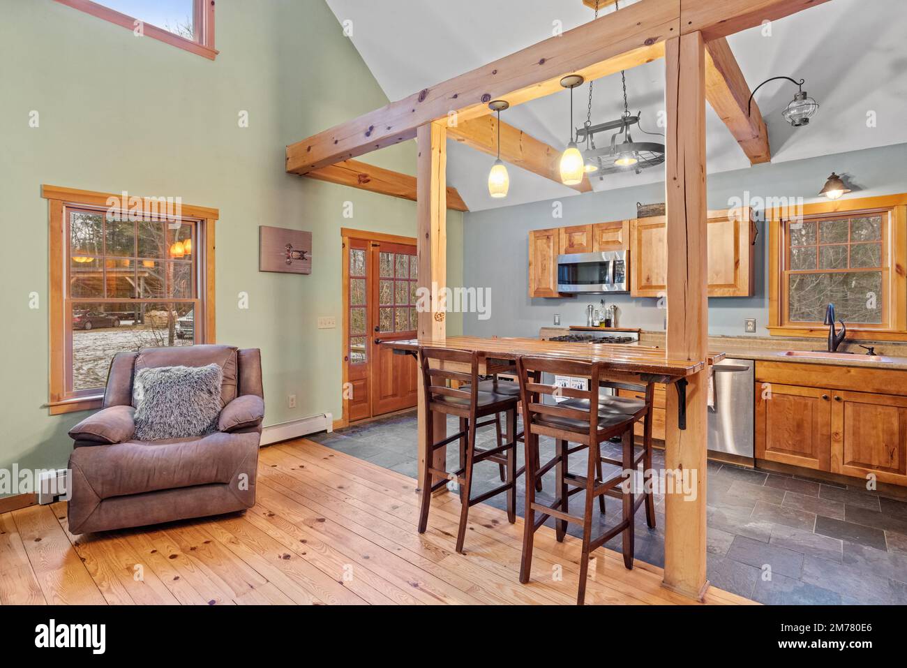 A rustic design living and dining area in an elegant house Stock Photo ...