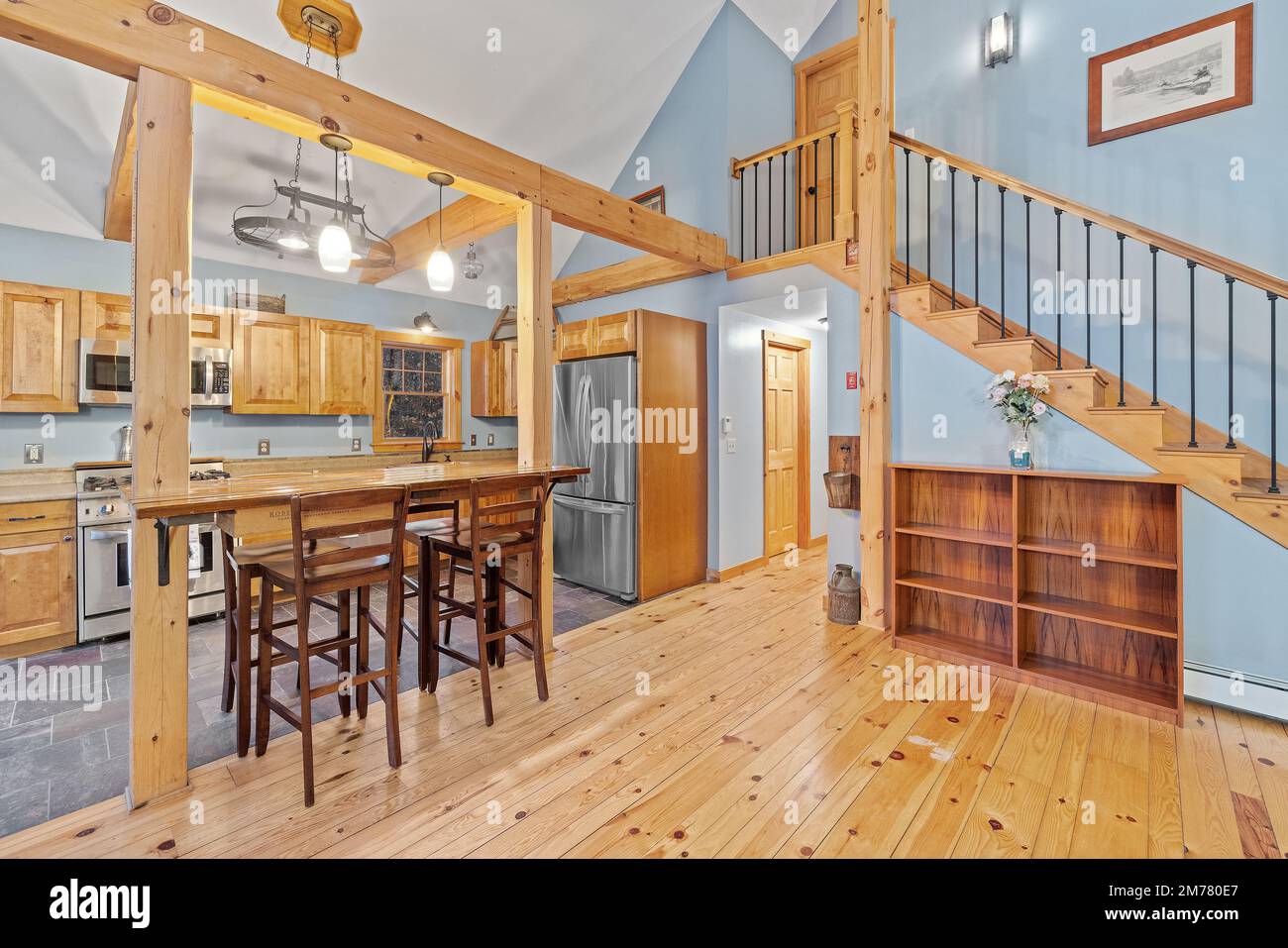 A rustic design living and dining area in an elegant house Stock Photo ...