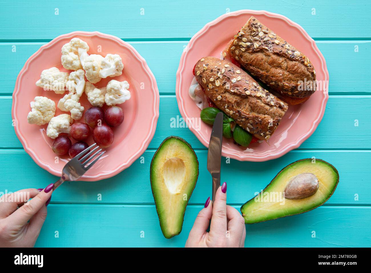 Concept of healthy food and diet. Plate with fresh sandwiches and fruit ...