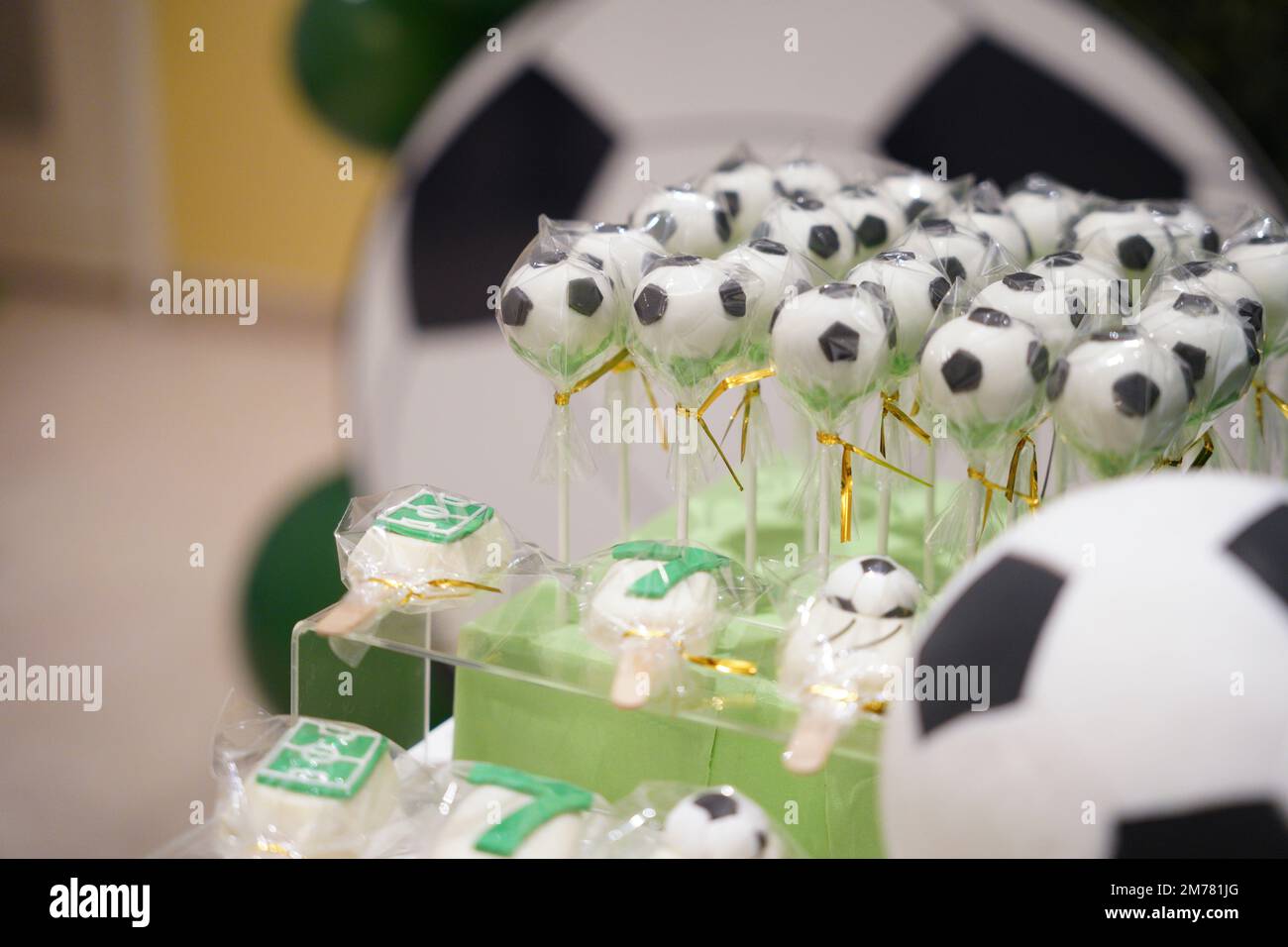 Soccer or football birthday candy table decorated with green biscuits ...