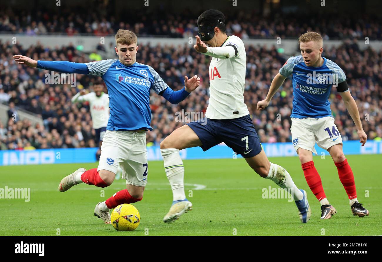 L-R Zak Swanson of Portsmouth and Tottenham Hotspur's Heung-Min Son and ...