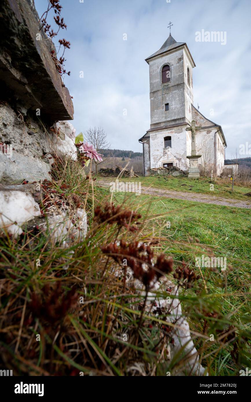 Vertical shot of old Church of Saint John of Nepomuk falling apart on a ...