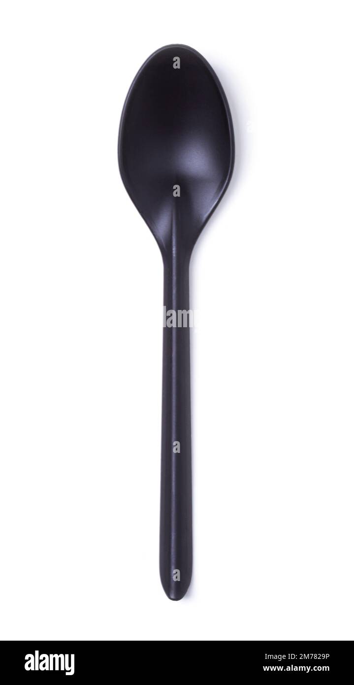Black plastic spoon close-up isolated on white. View from above Stock ...