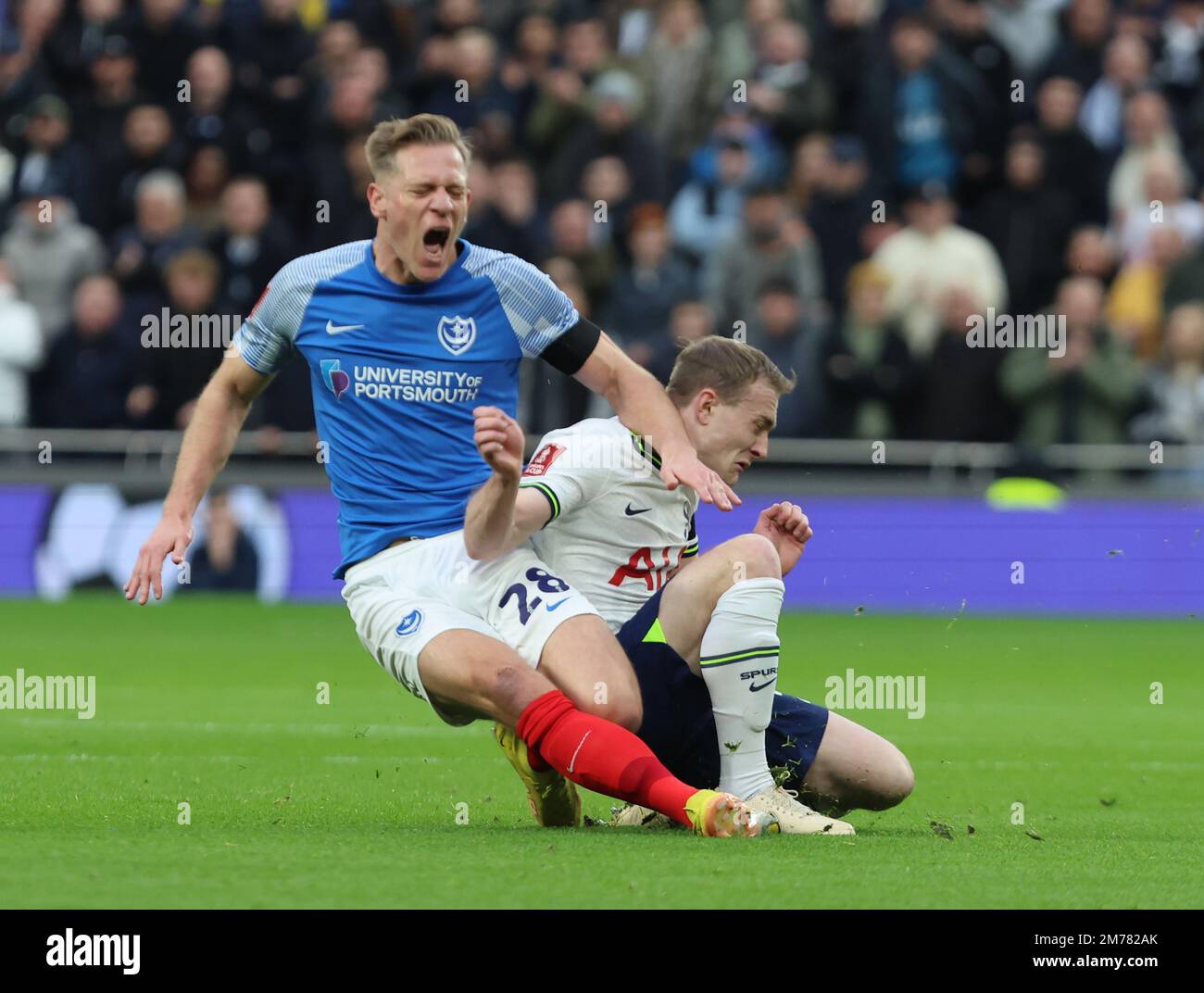 L-R Michael Morrison of Portsmouth and Tottenham Hotspur's Oliver Skipp ...