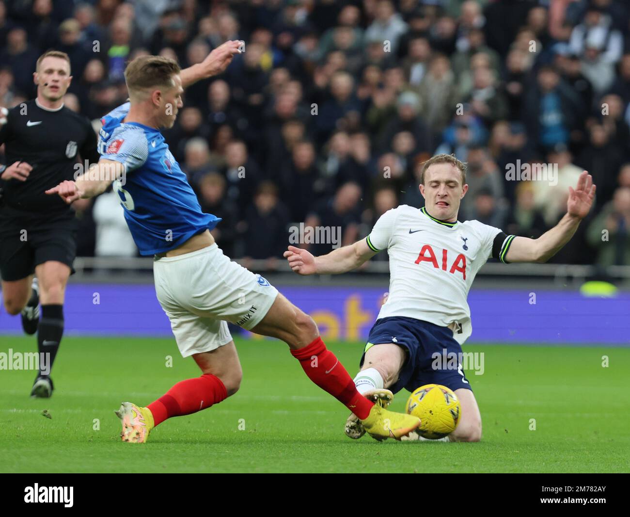 L-R Michael Morrison of Portsmouth and Tottenham Hotspur's Oliver Skipp ...