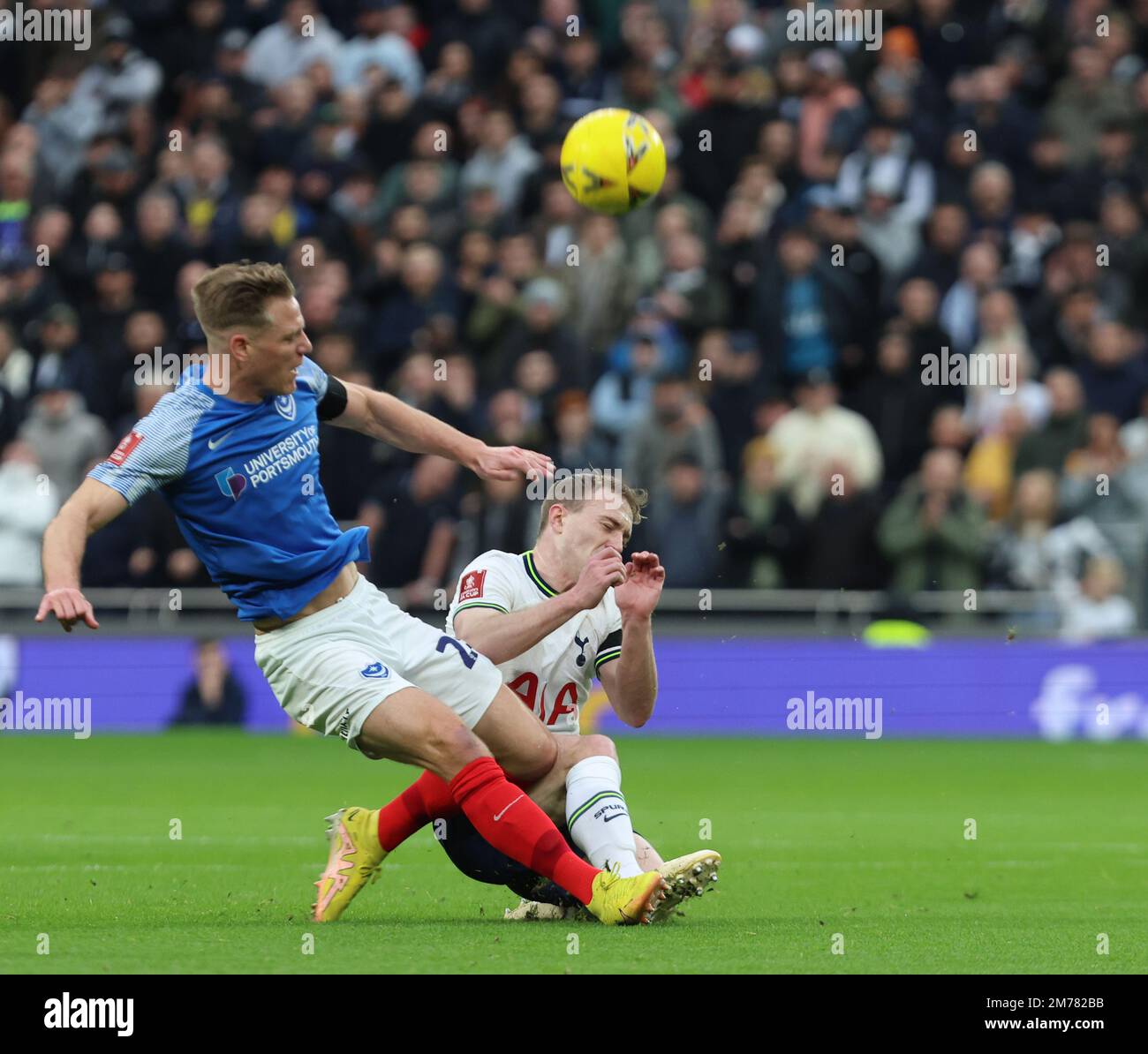 L-R Michael Morrison of Portsmouth and Tottenham Hotspur's Oliver Skipp ...