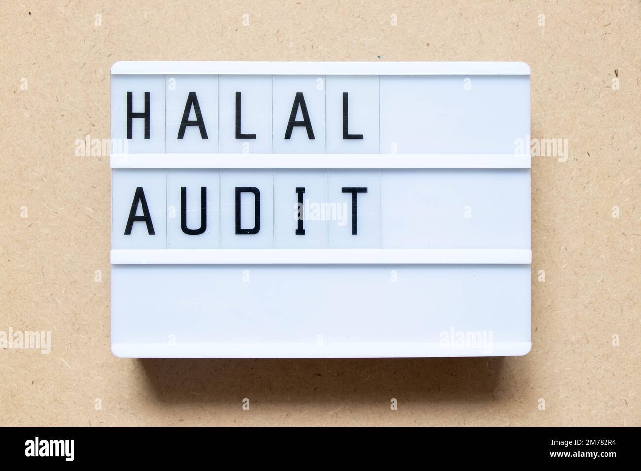Lightbox with word halal audit on wood background Stock Photo - Alamy