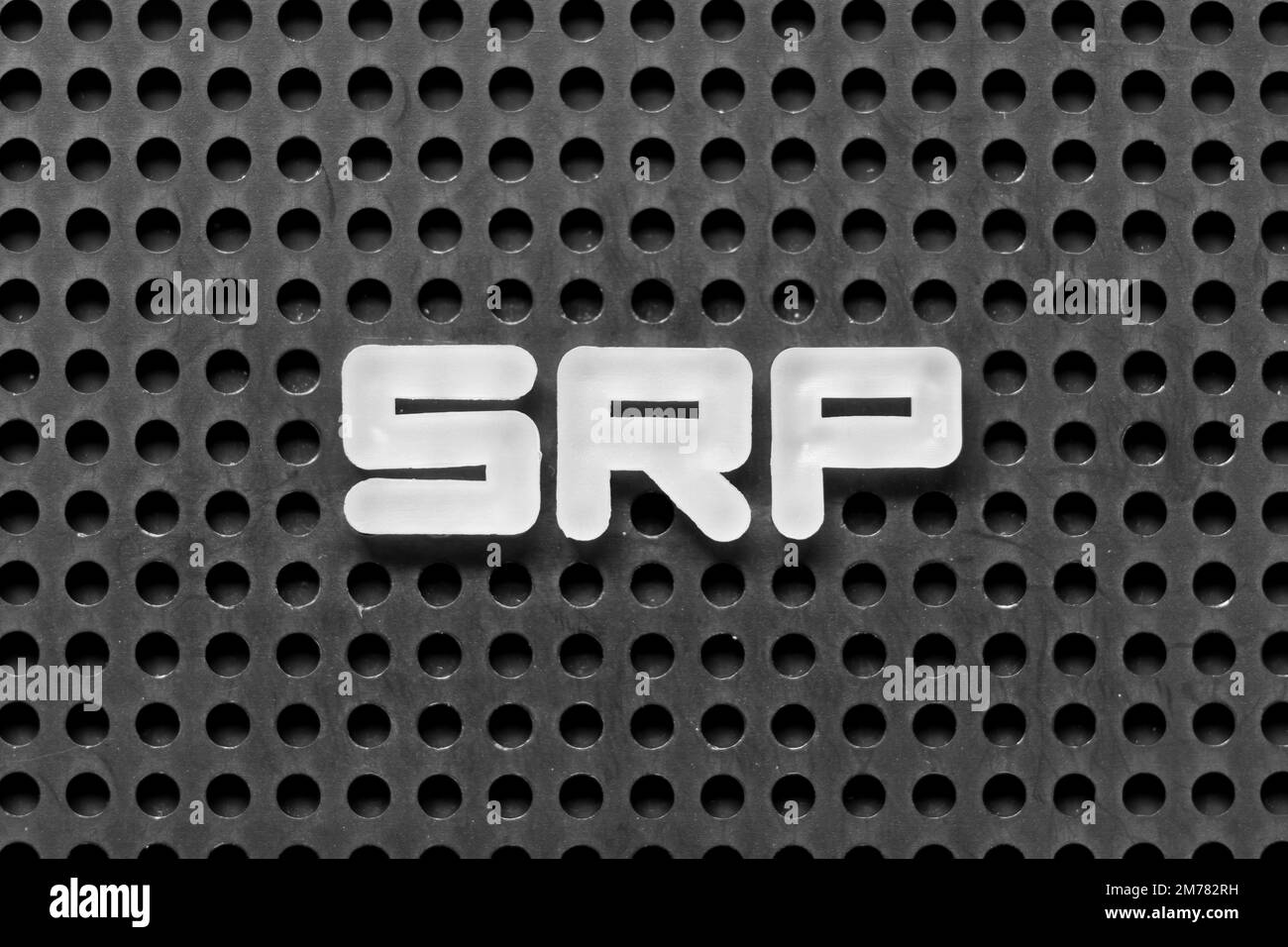 White alphabet letter in word SRP (Abbreviation of suggested retail ...