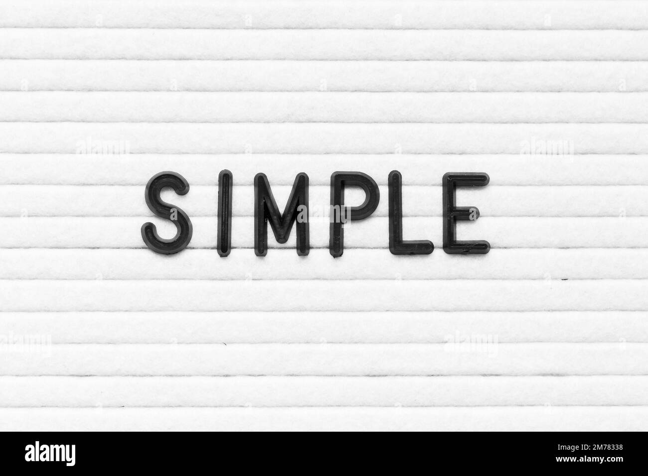 Black color letter in word simple on white felt board background Stock ...