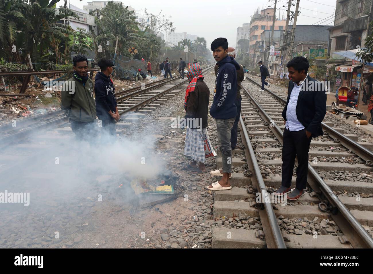 Dhaka, Bangladesh - January 08, 2023: People are burning fire at ...