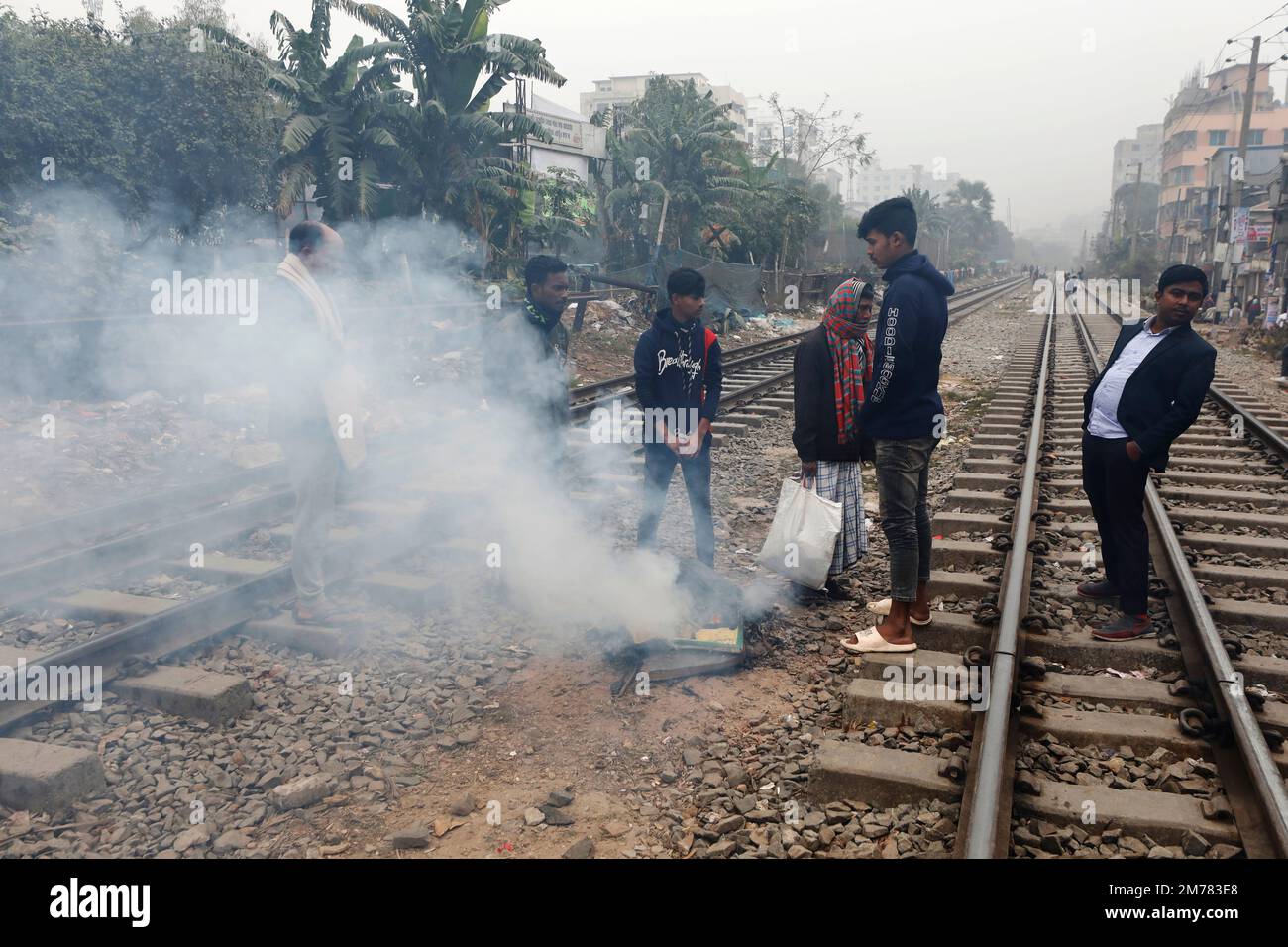 Dhaka, Bangladesh - January 08, 2023: People are burning fire at ...