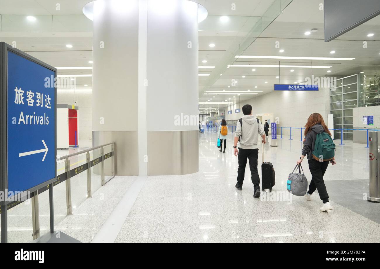 Shanghai. 8th Jan, 2023. Inbound passengers arrive at Shanghai Pudong ...