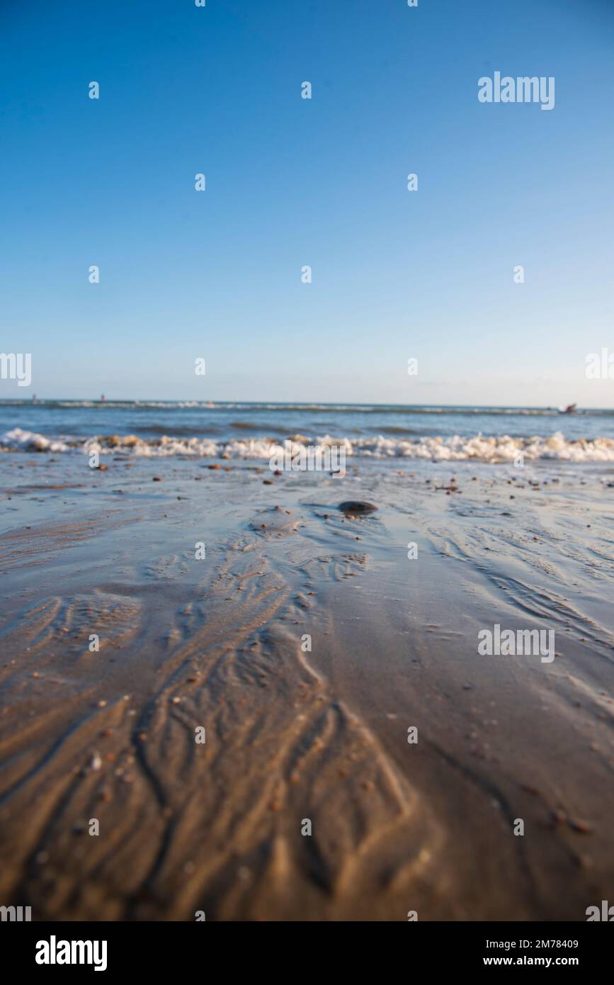 The soft waves at low tide on Brighton beach Stock Photo - Alamy