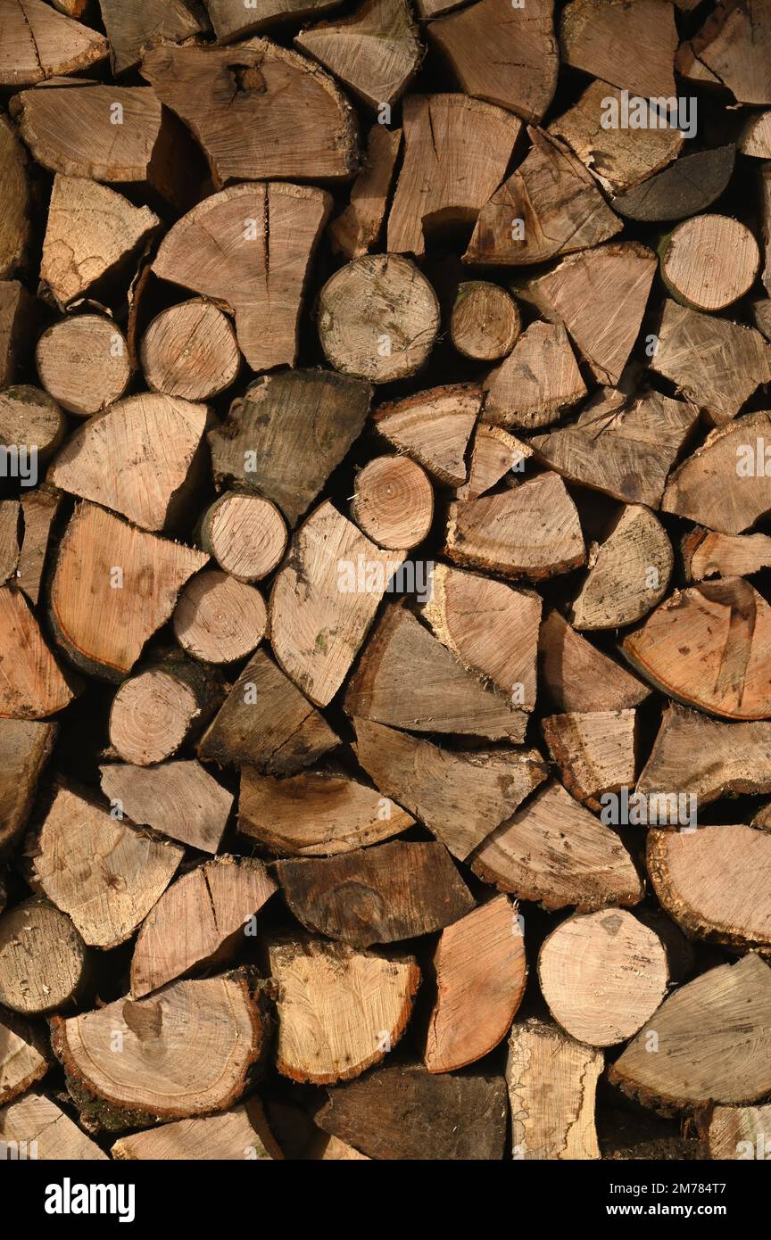 Wood pile background tall Stock Photo - Alamy