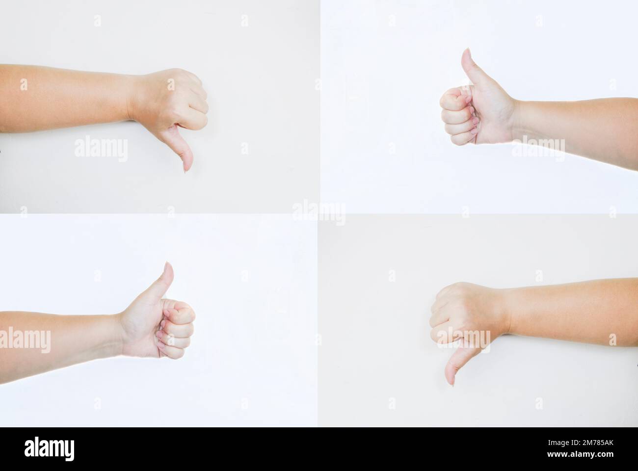 Hand with ok gesture, opposite a hand with bad gesture, on a white-gray ...