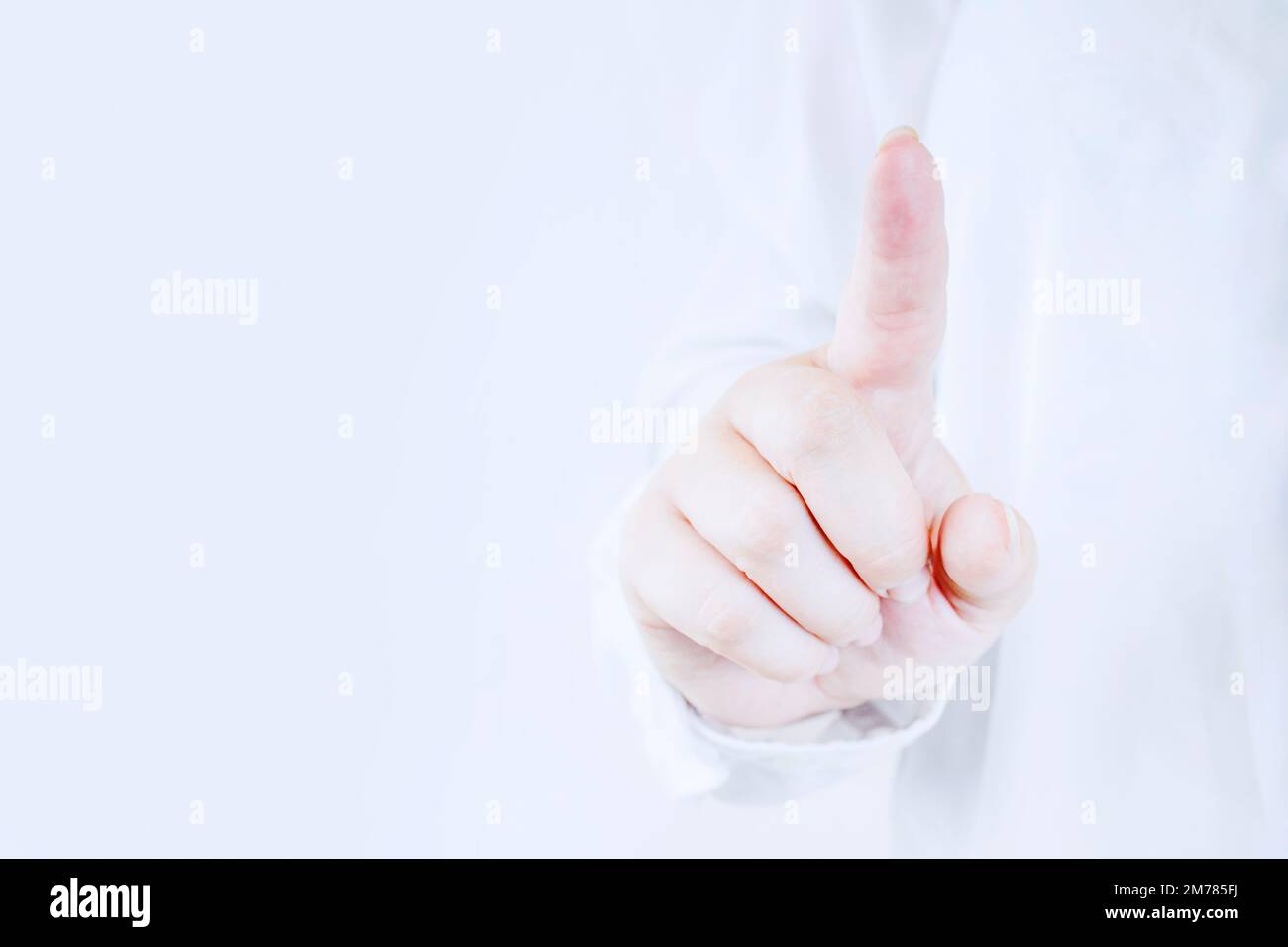 A female hand presses a finger on the virtual touch buttons. Copy space ...