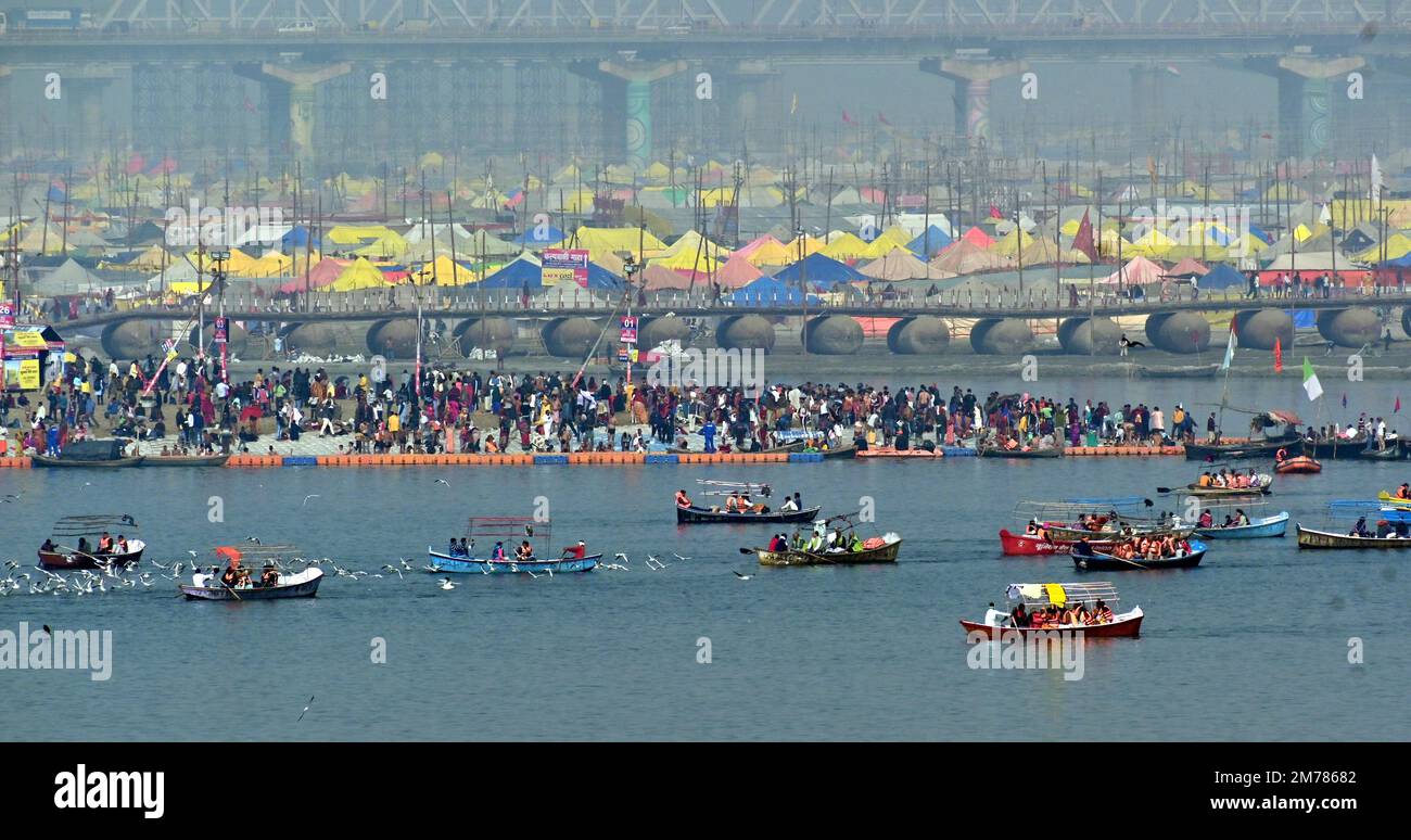 INDIA, PRAYAGRAJ, 8th JANUARY : Devotees take a boat ride on the river ...