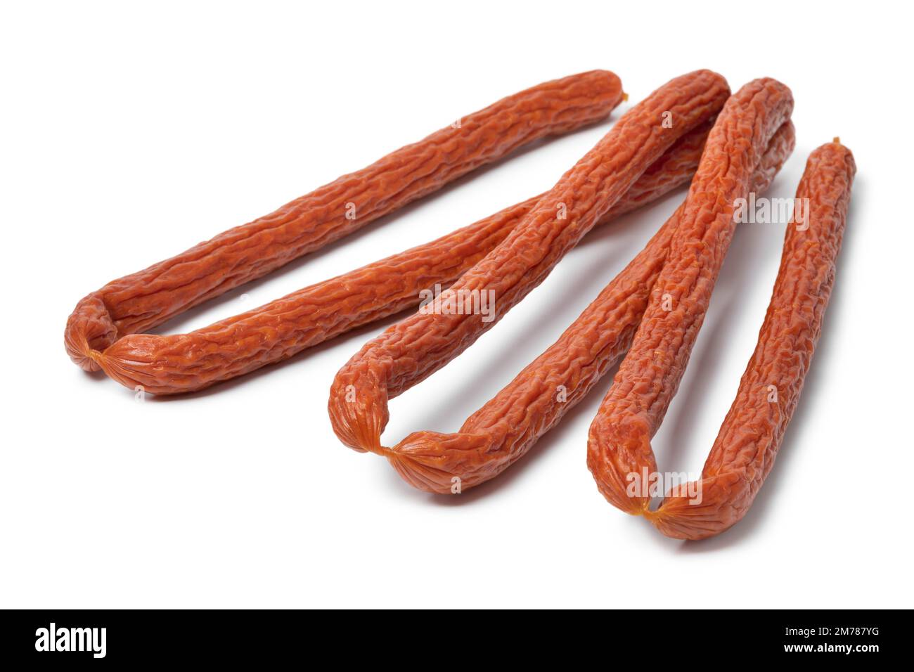 Traditional Cabanossi sausages close up for a snack isolated on white ...
