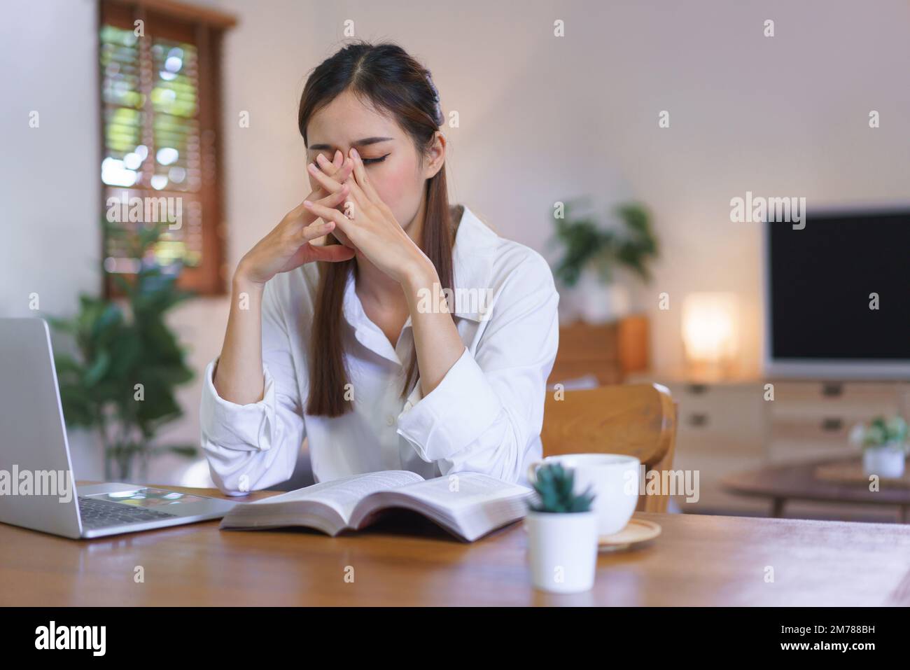 Working at home concept, Women tired and exhausted after reading and ...