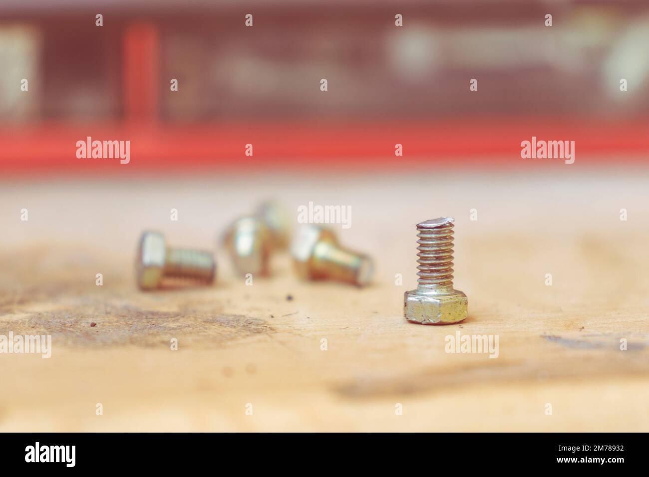 Close-up of bolts on a table. Concept of car mechanic tools, industrial ...