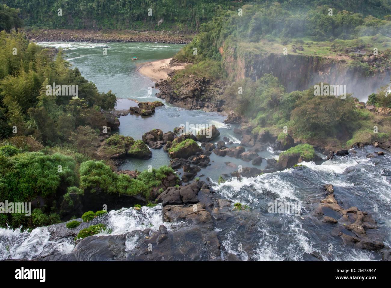 A closeup shot of a river stream with forests Stock Photo - Alamy