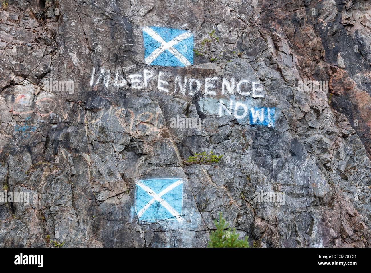 Scottish Independence protest painted onto a rock face alongside the A9 ...