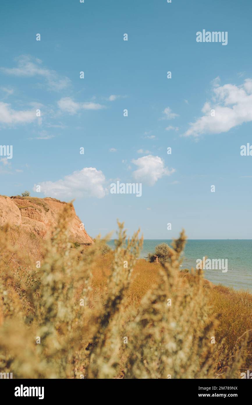 Amazing landscape with sea bay, sand beach and coastal hills and rocks ...