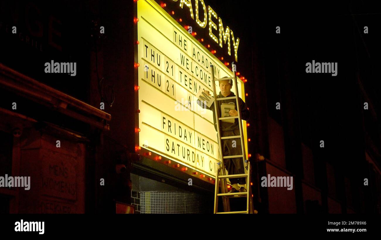 Man changes the letters on a theater billboard - DUBLIN, IRELAND ...