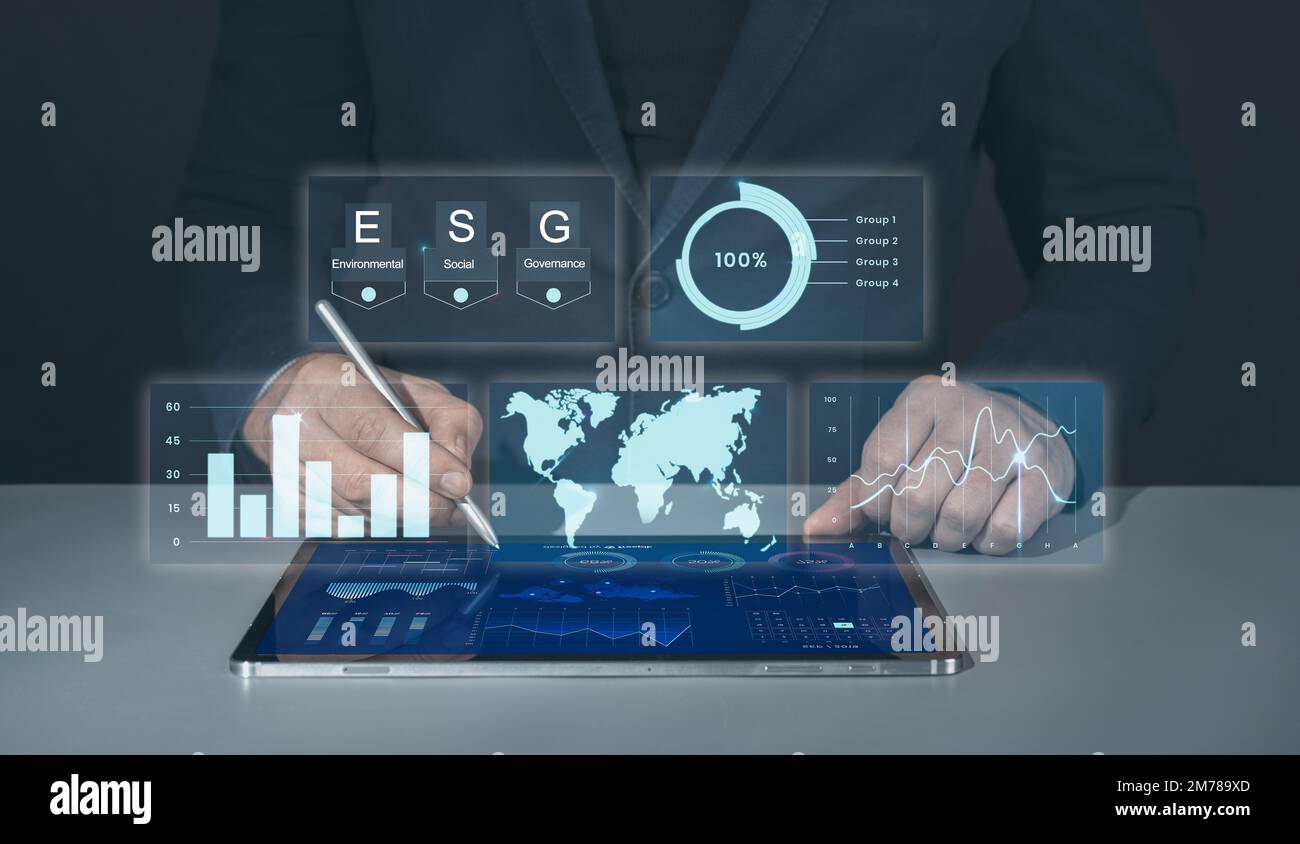 Businessman use tablet for analyze Environmental technology and ...