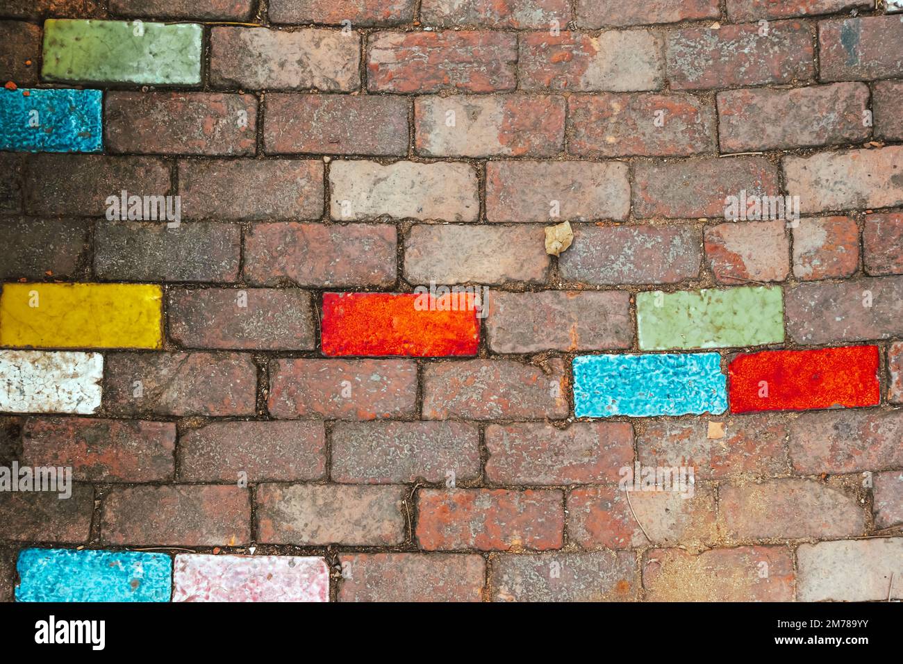 Top view of old beautiful multicolor bricks paving stones footpath ...