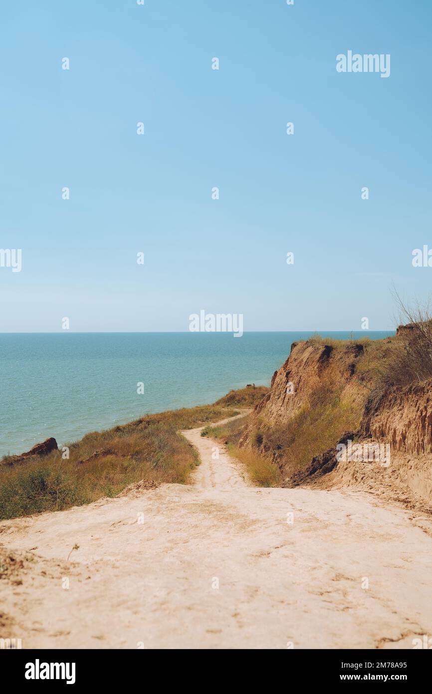 Amazing landscape with sea bay, sand beach and coastal hills and rocks ...