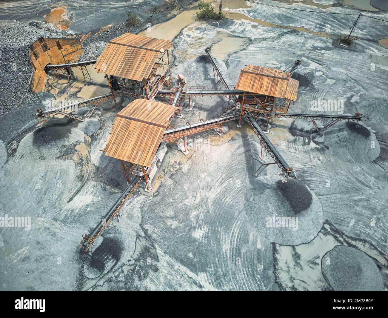 Stone crushing system at open pit mining quarry Stock Photo - Alamy