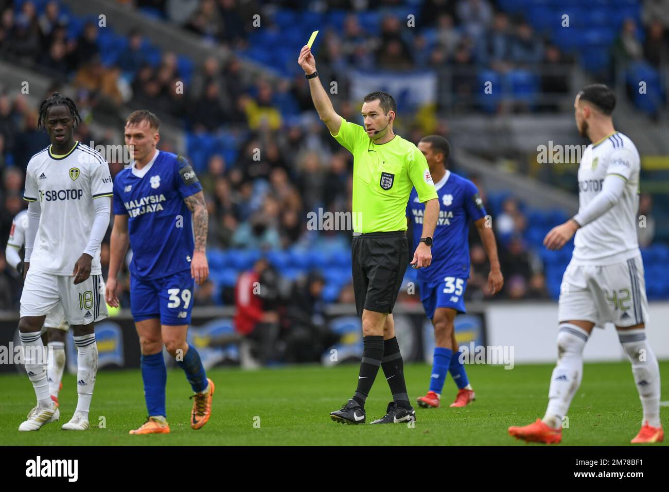 Referee Jarred Gillett gives a yellow card during the Emirates FA Cup ...