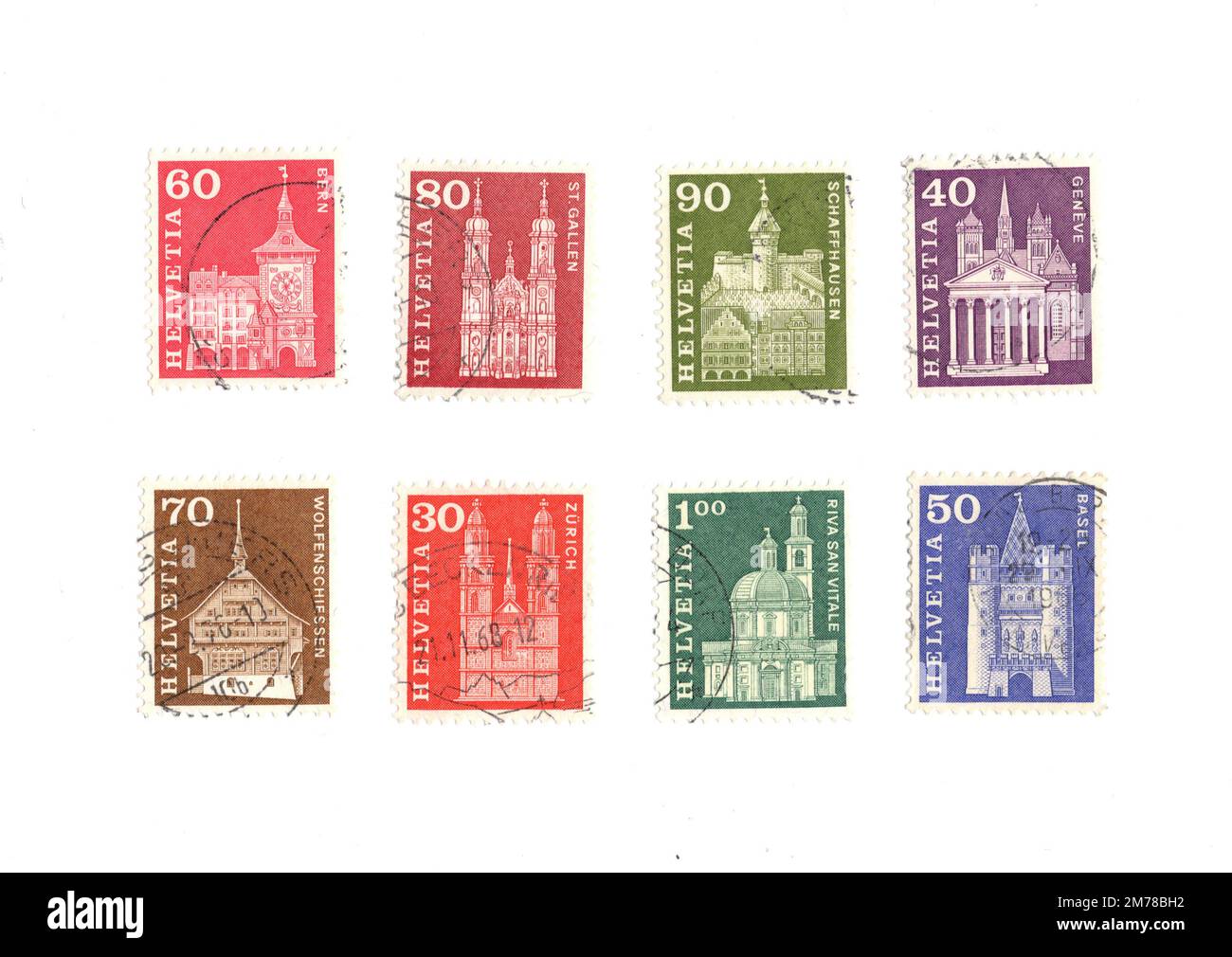 Vintage used postage stamps from Switzerland isolated on a white ...