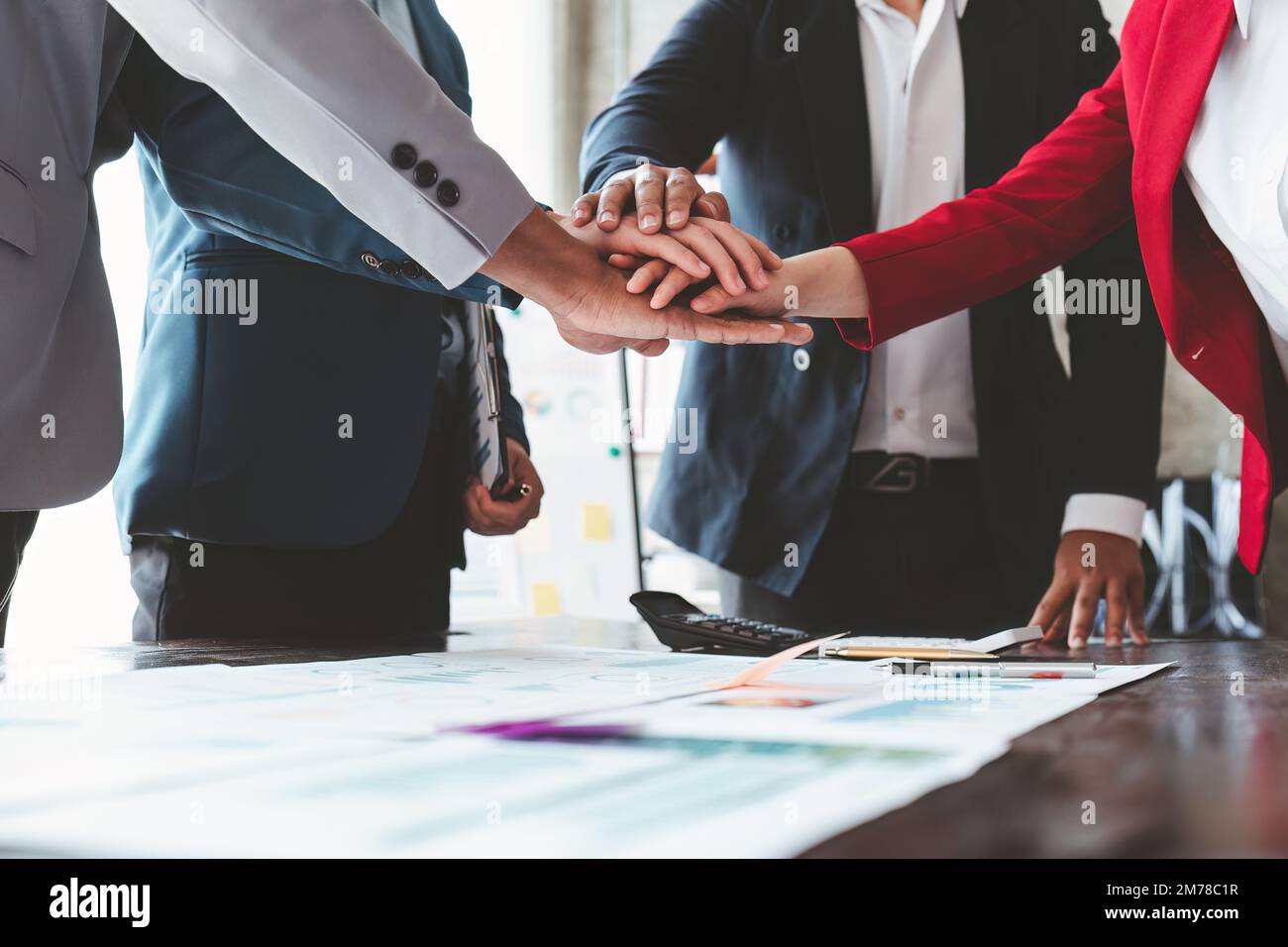 Close up Asian Business people stack of hands working together. Teamwork, Unity, business team ...