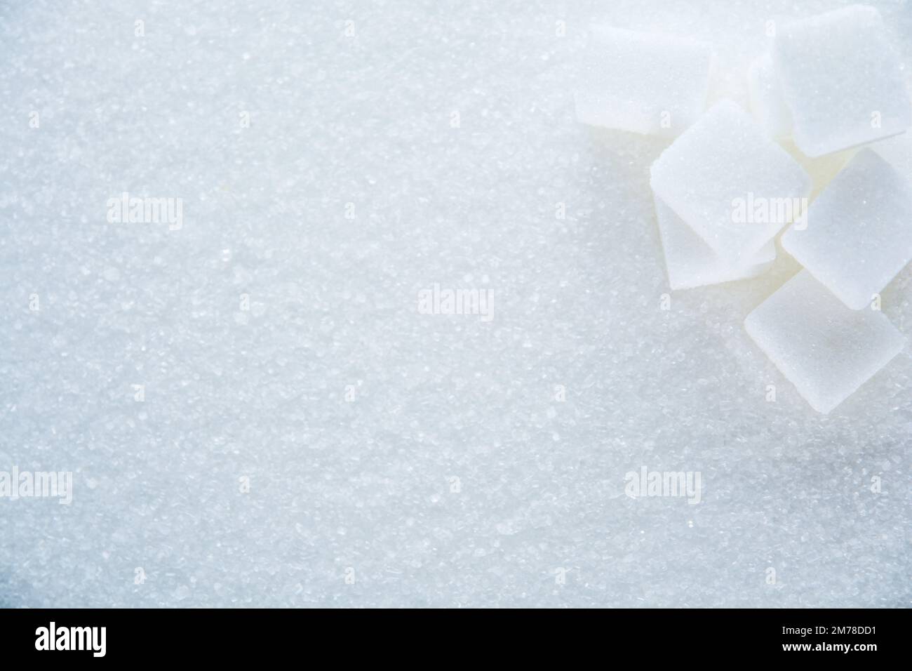 A stack of sugar cubes on a sugary surface Stock Photo - Alamy