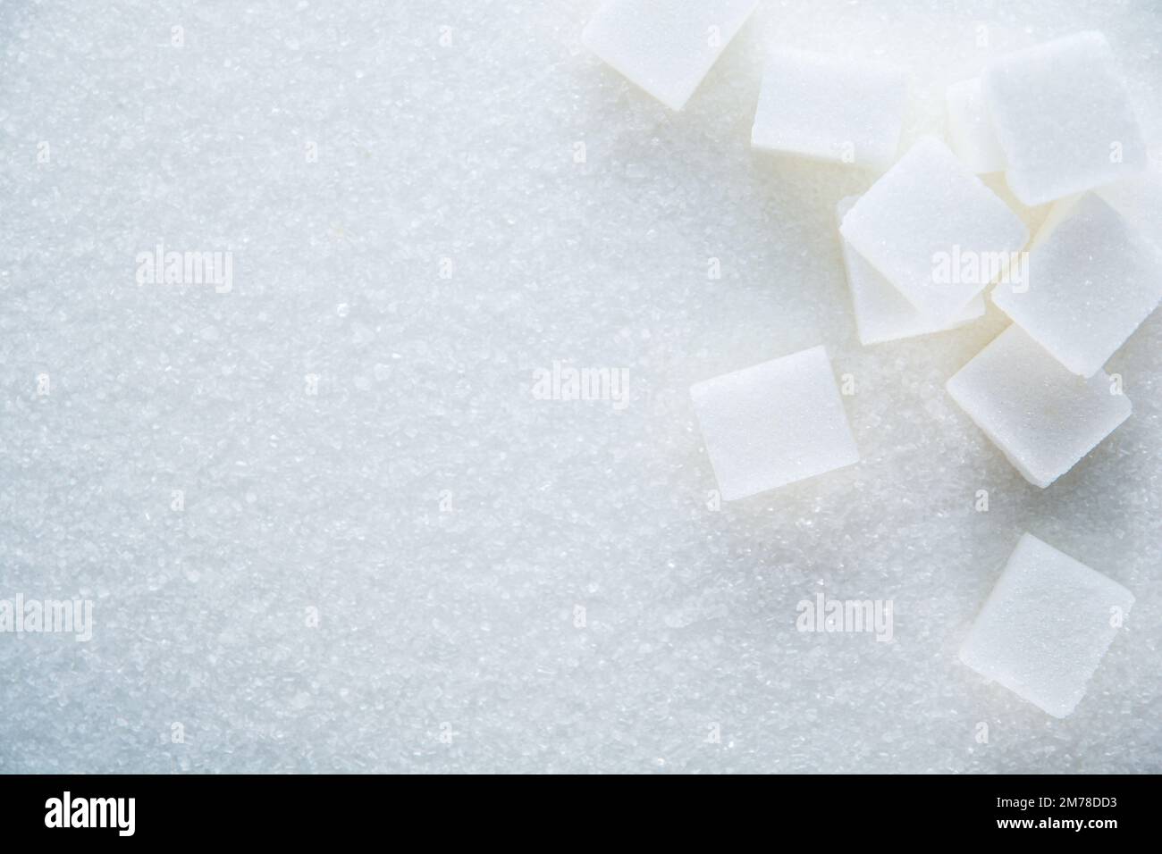 A stack of sugar cubes on a sugary surface Stock Photo - Alamy